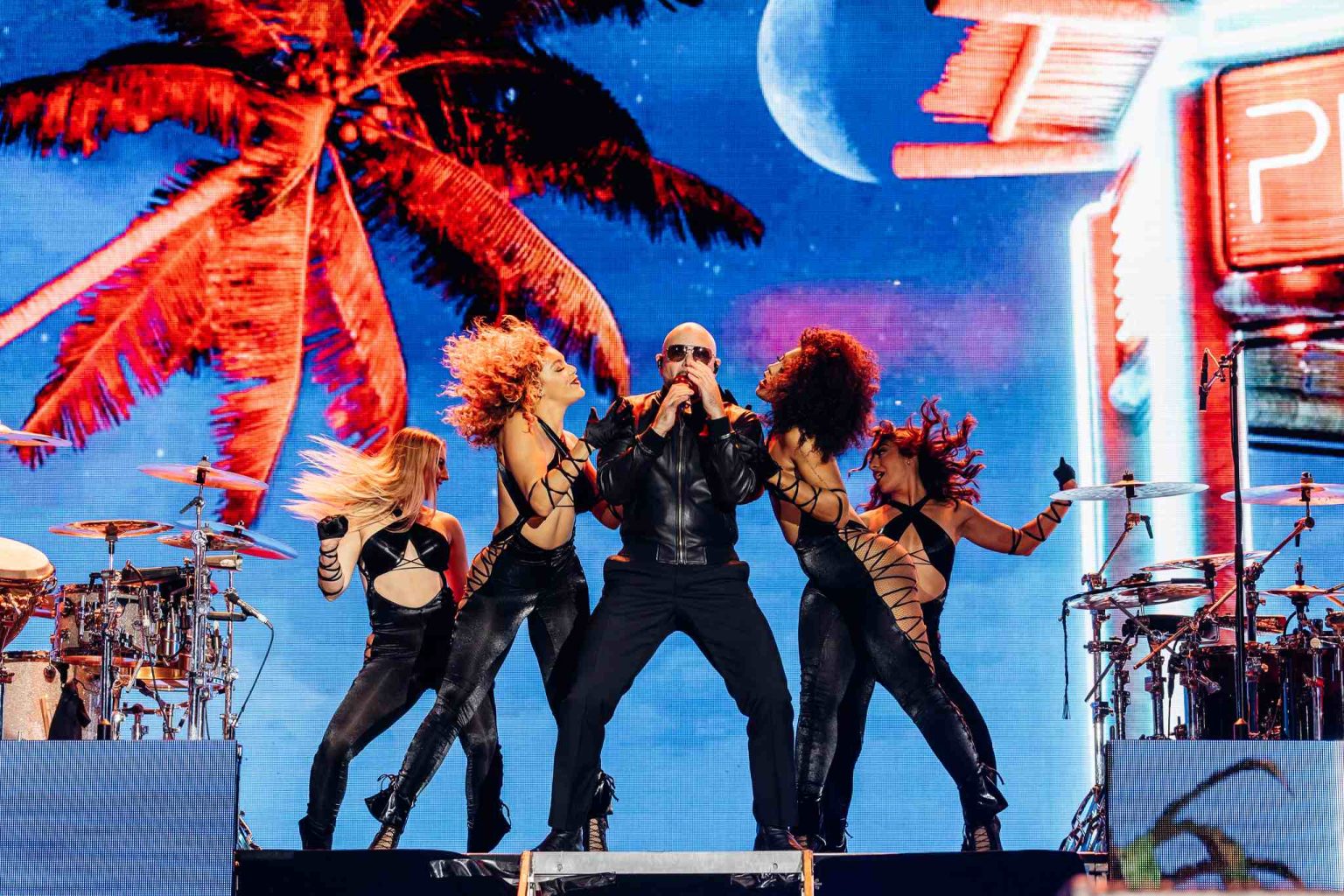 Live Review: Fridayz Live 2025 Featuring Mariah Carey and Pitbull ...